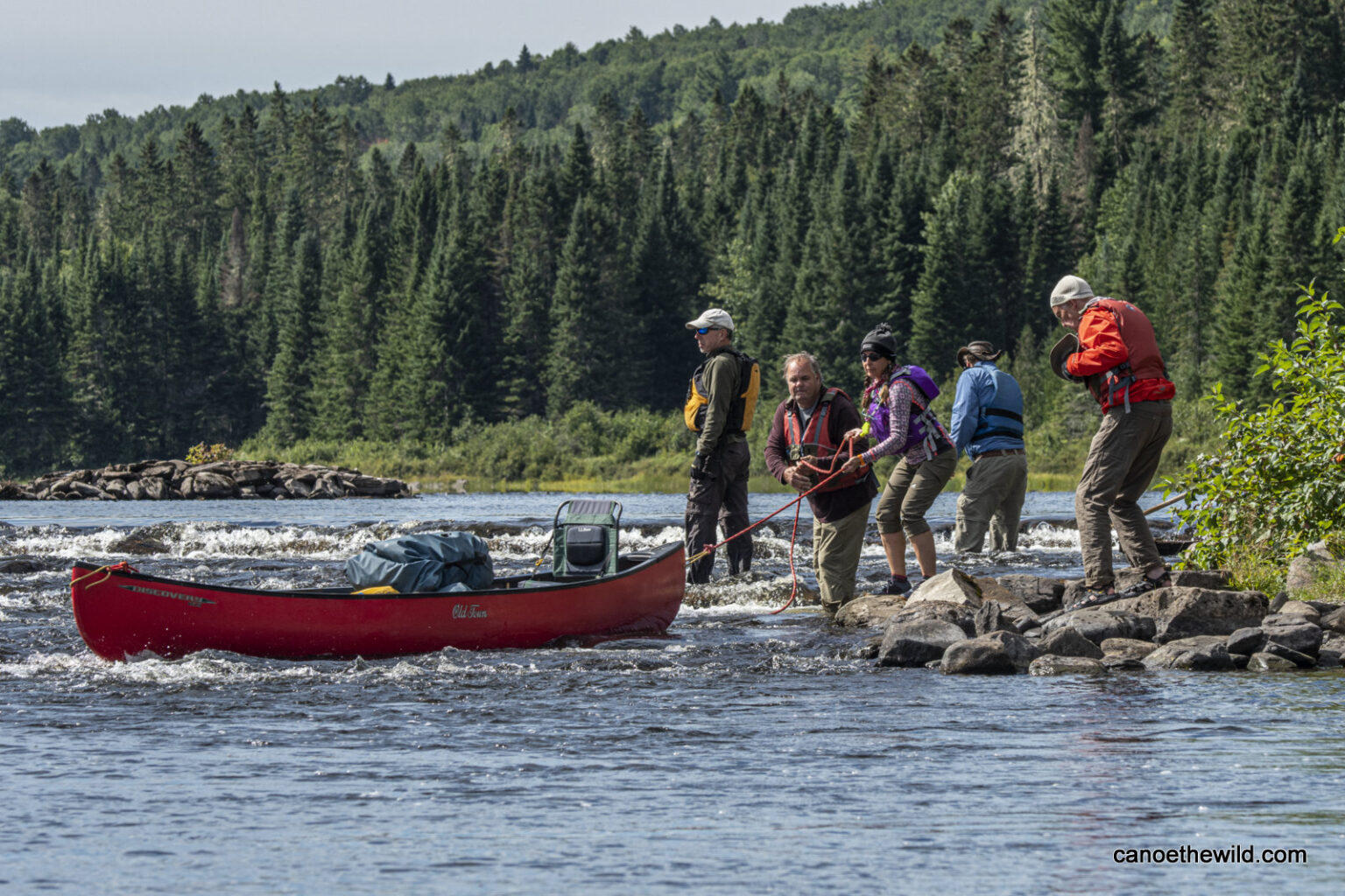 Canoe lining Long Lake Dam - Canoe the Wild