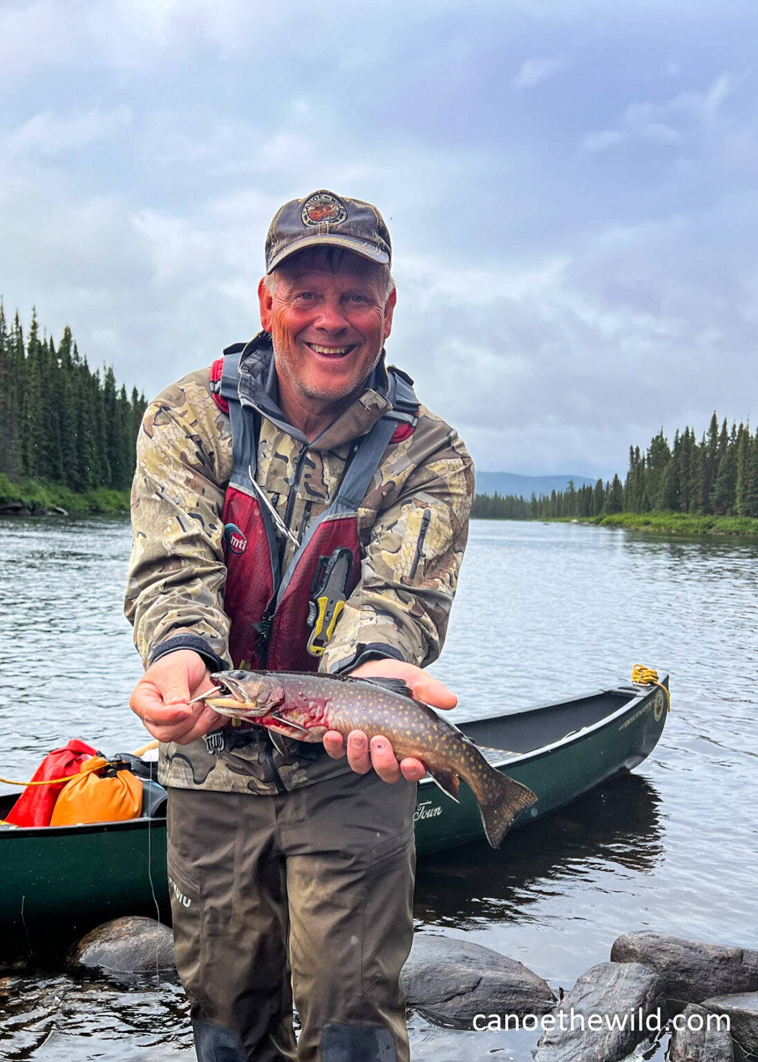 Canoe the Wild owner and guide Dave Conley with a brook trout caught on ...